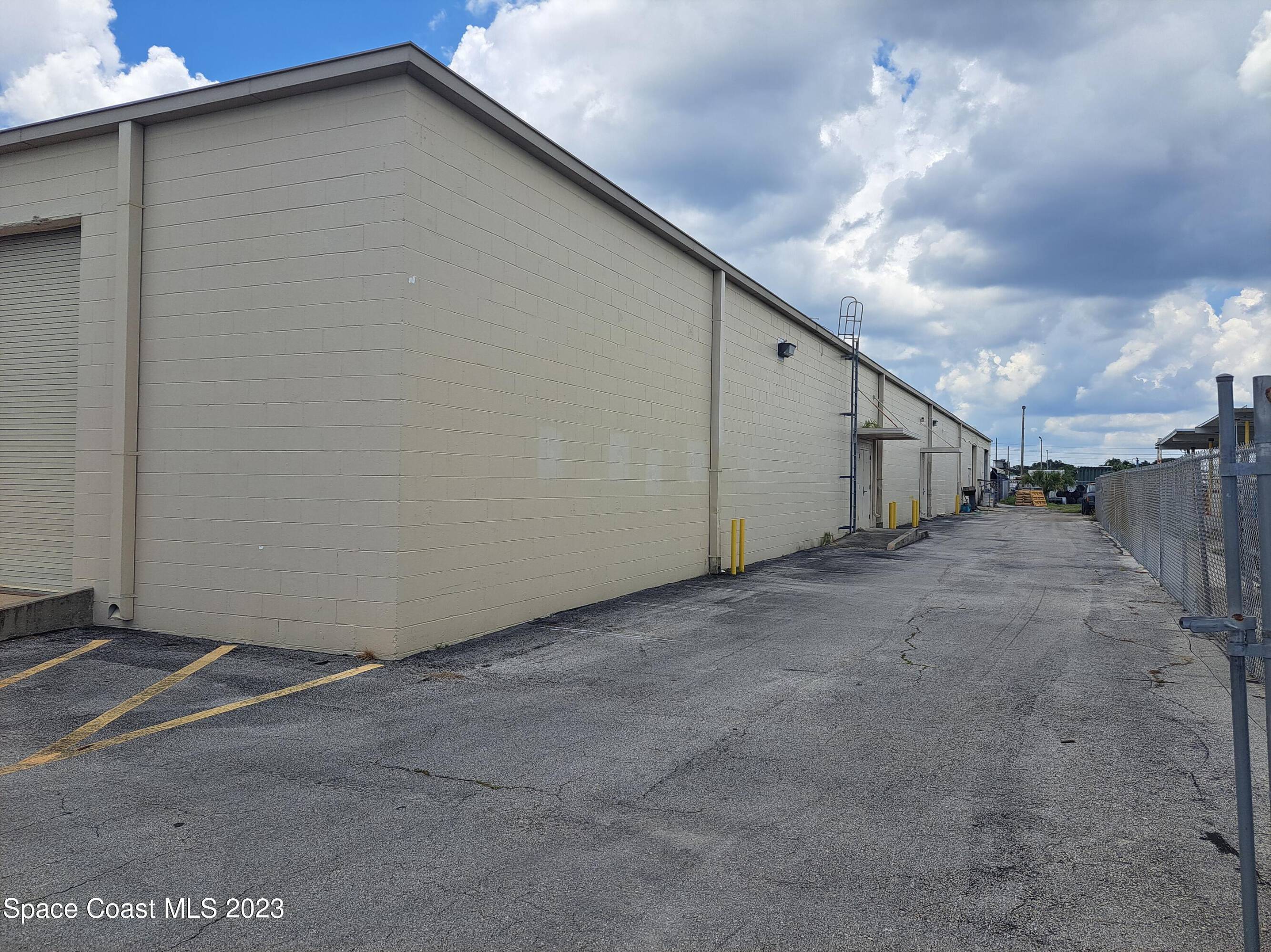 2465 PALM BAY RD NE Palm Bay FL 32905-3353 APN: 28-37-23-00-00256.0 ...